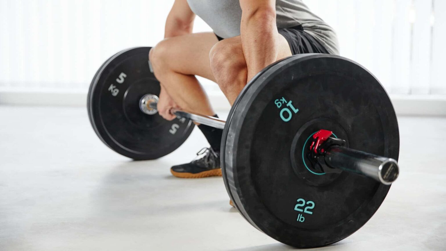 Should You Build Your Home Gym Around Free Weights or Machines?